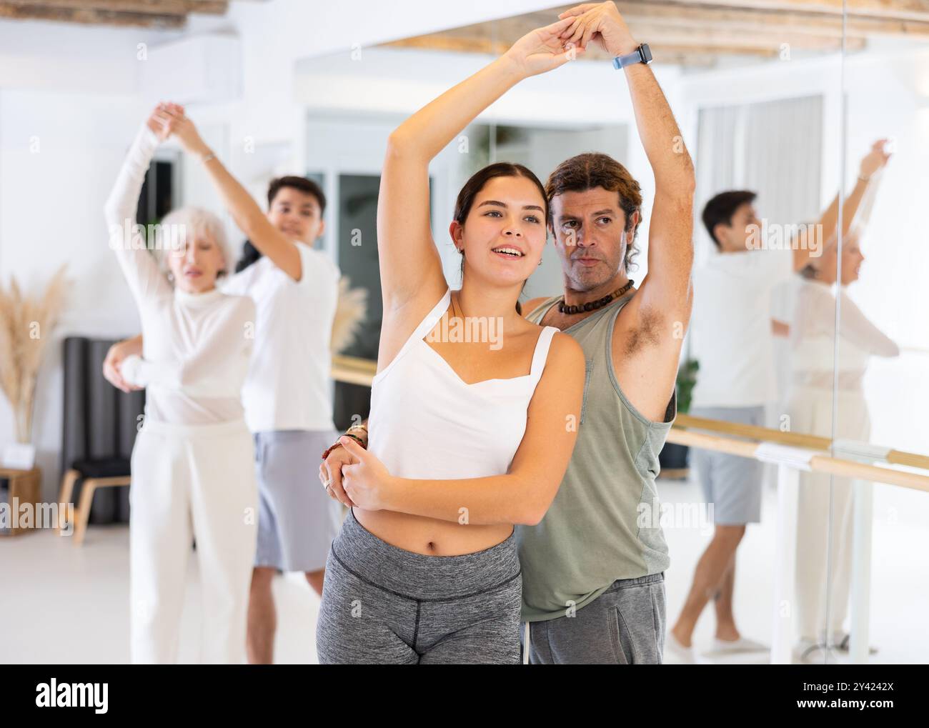 Young women dancing in front of mirror hi-res stock photography and ...