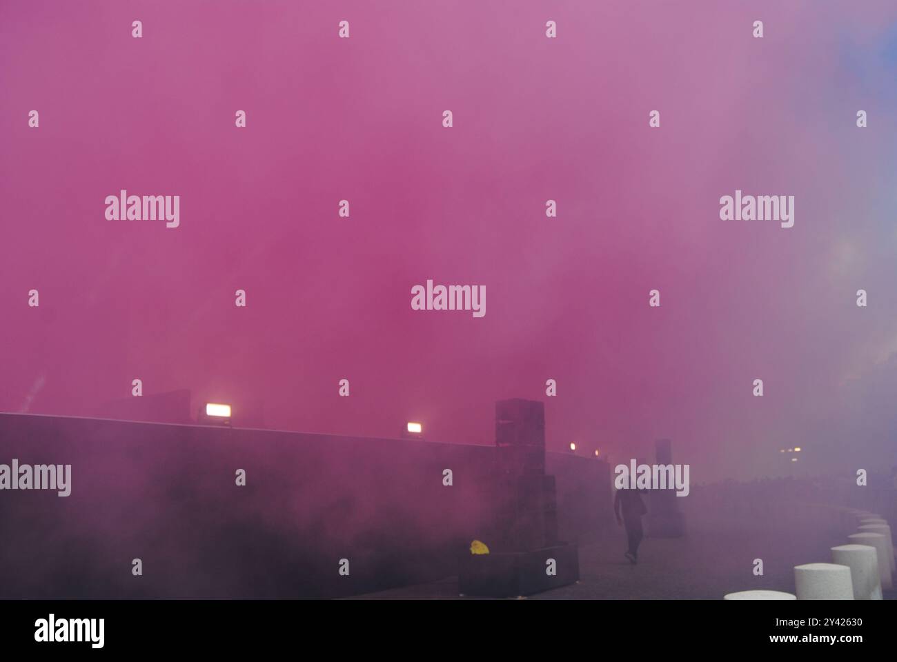 Paris, France - September 14 2024: Red smoke erupts around the Arc de ...