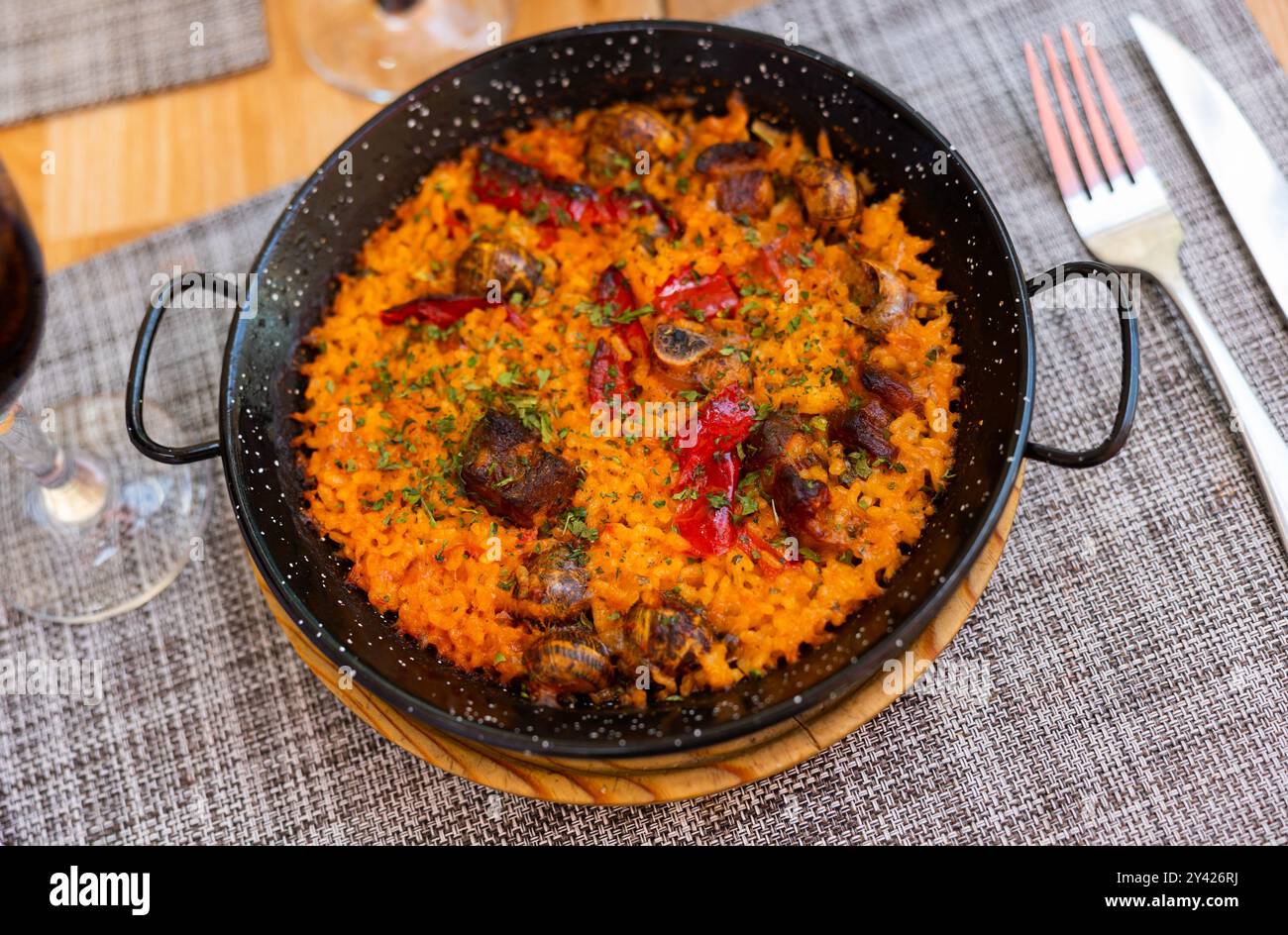 Traditional Valencian rice paella with snails Stock Photo - Alamy