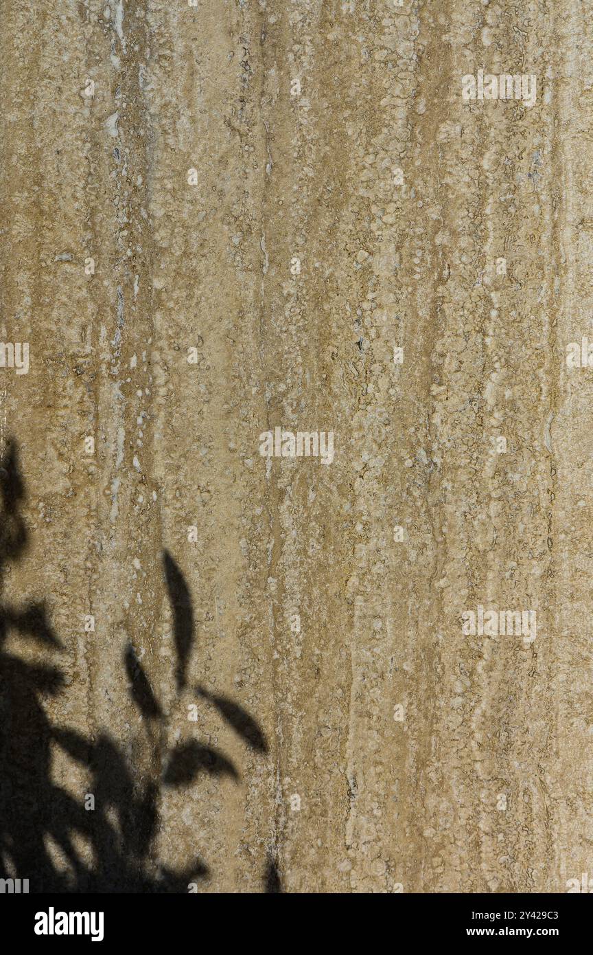 texture of the old wall with water stains and with holes from old age ...