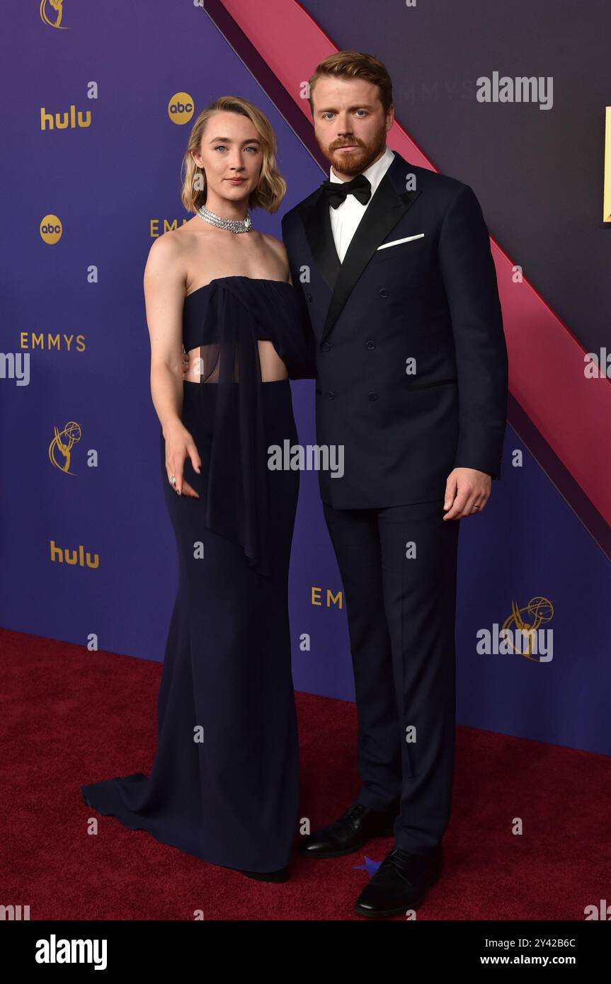Saoirse Ronan, left, and Jack Lowden arrive at the 76th Primetime Emmy ...