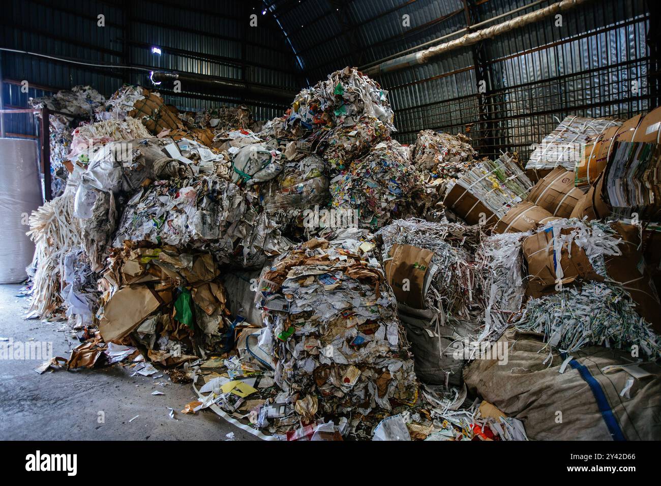 Stack of waste paper at the recycling factory Stock Photo - Alamy