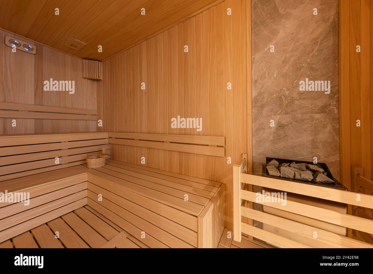Interior of the Finnish sauna, classic wooden sauna with hot steam ...