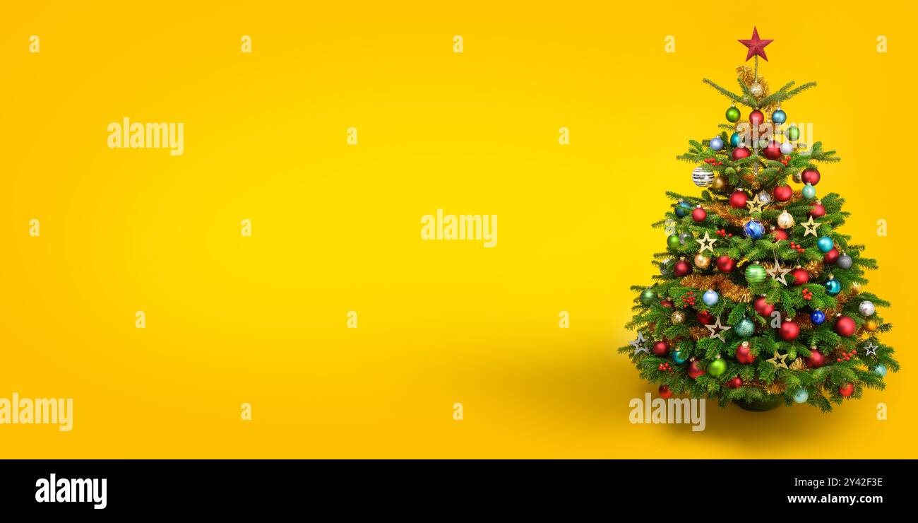 Gorgeous decorated Christmas tree on a wide bright yellow background. A ...