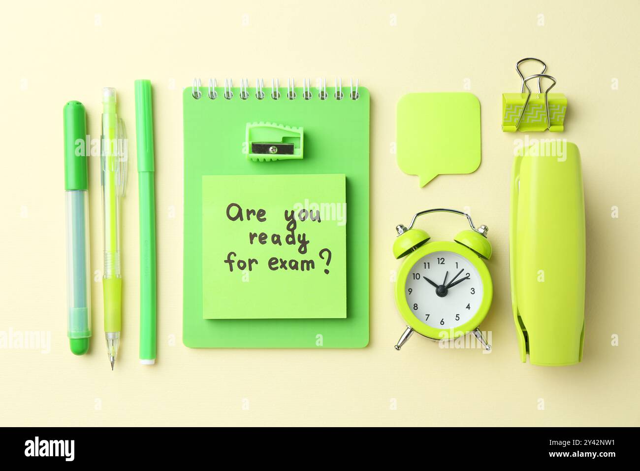 Paper note with question Are You Ready For Exam and stationery on pale ...