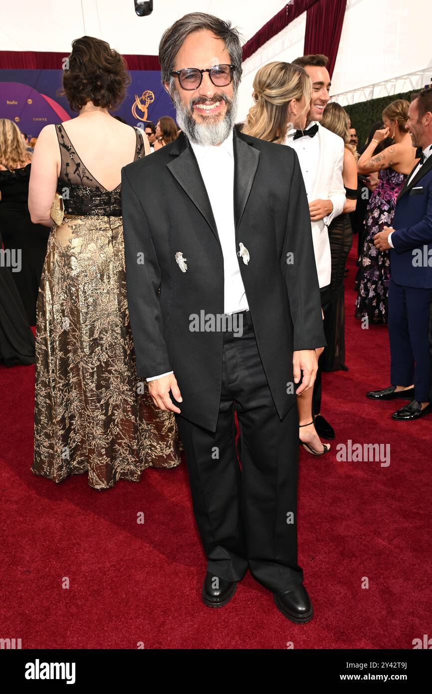 Gael Garcia Bernal walks the Red Carpet at the 76th Emmy Awards on ...