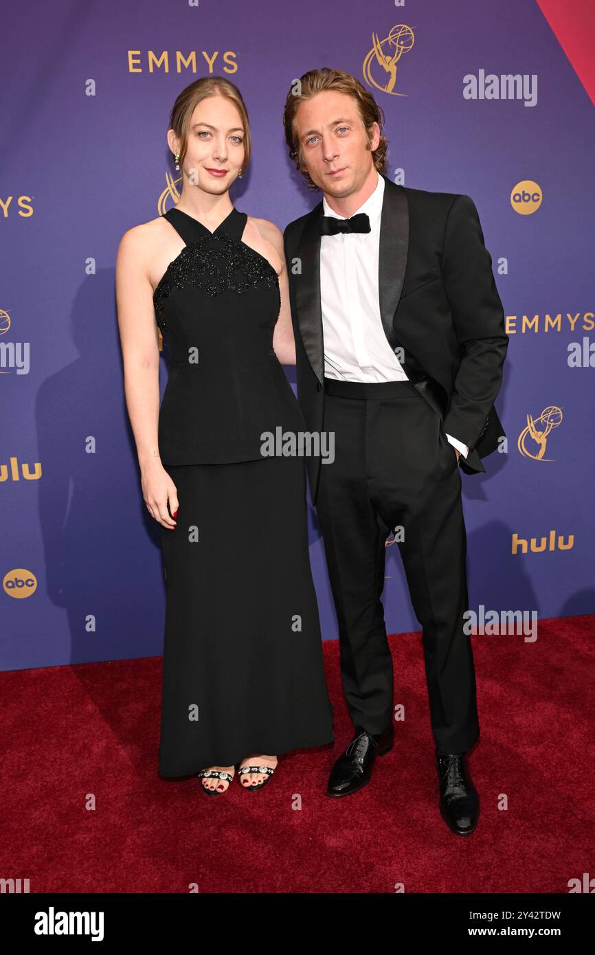Annabelle White, left, and Jeremy Allen White walk the Red Carpet at the 76th Emmy Awards on ...
