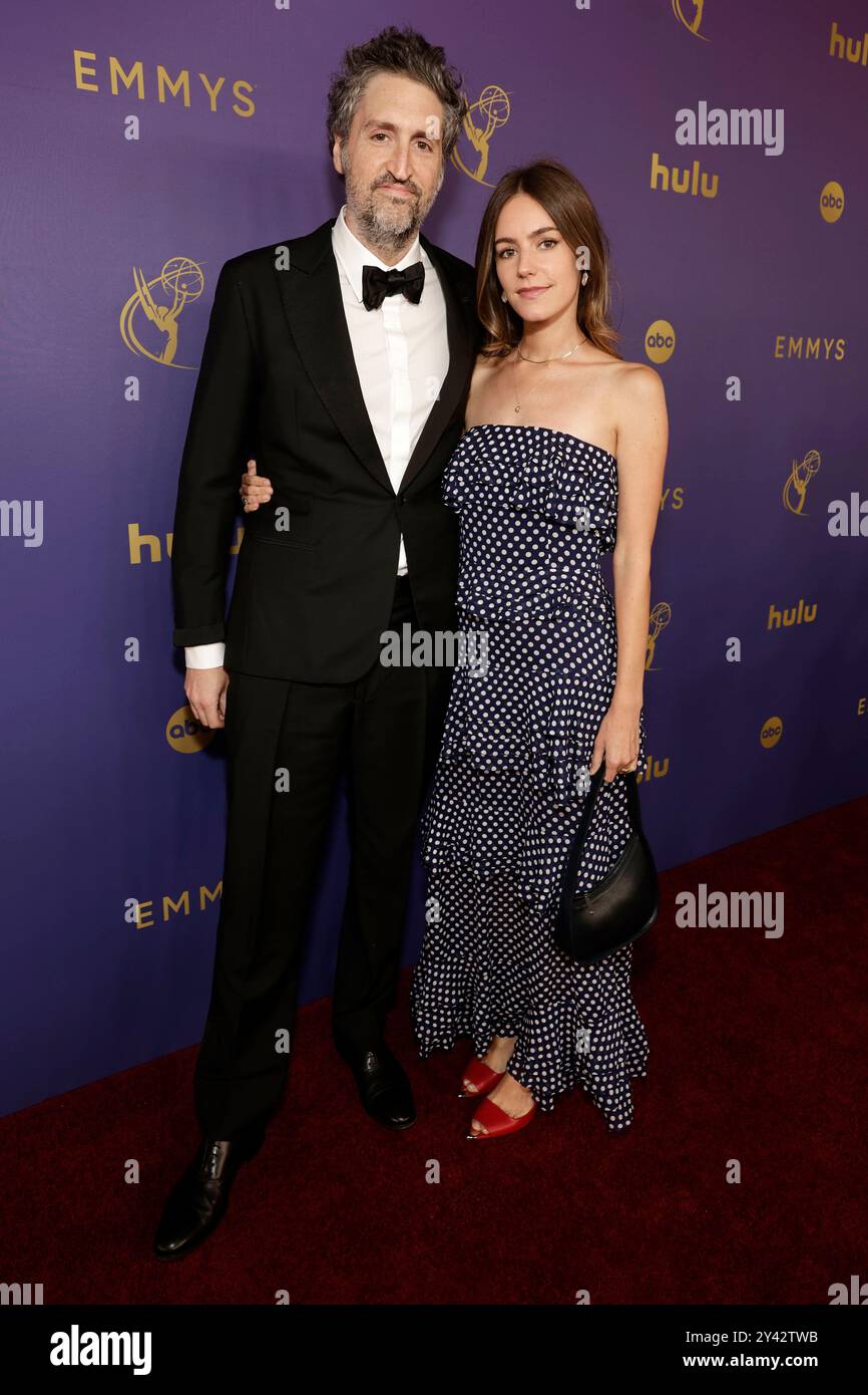 Garrett Basch and Emily Shaw walk the Red Carpet at the 76th Emmy ...