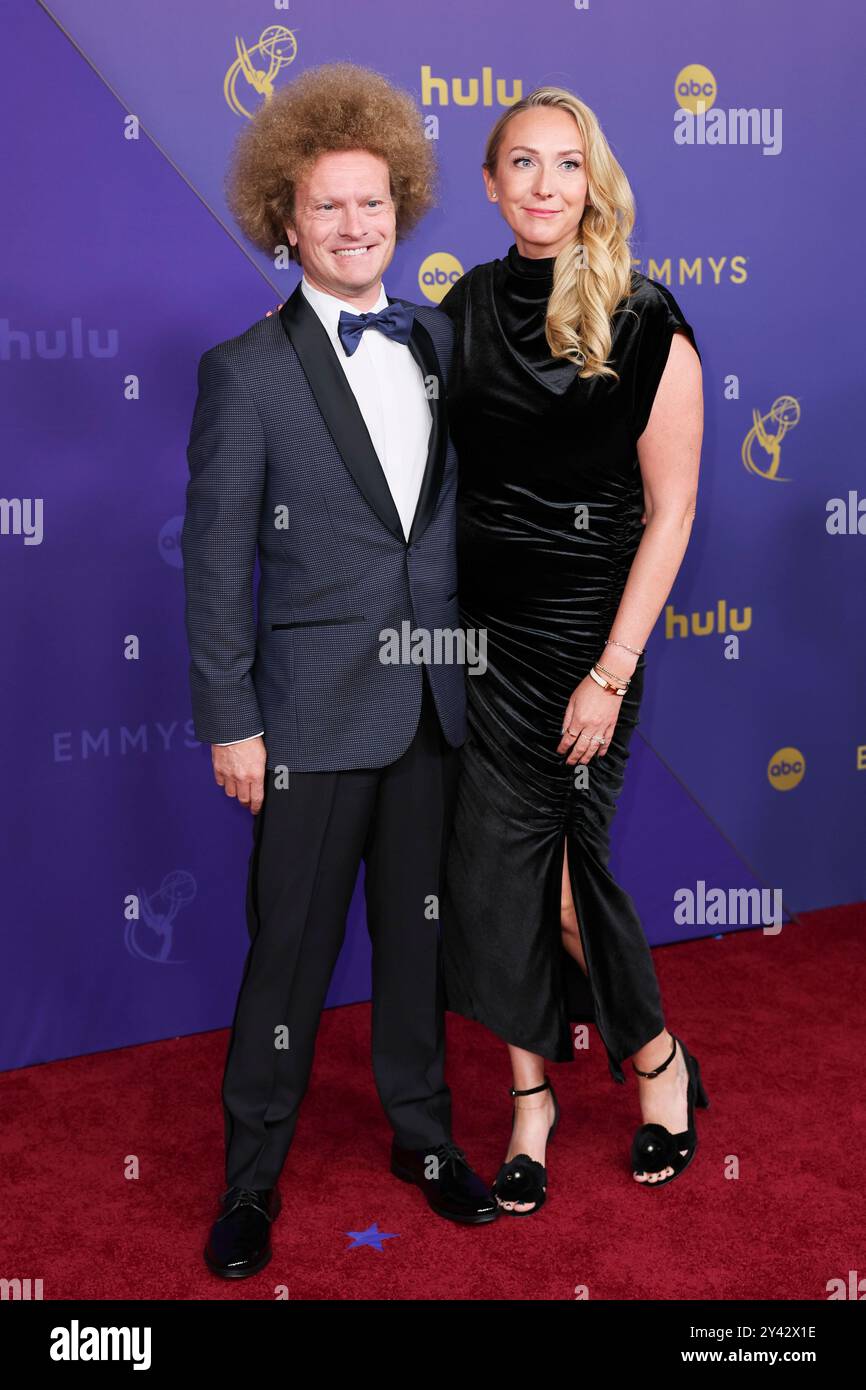 Adam Feil and Brittney Feil poses for a Red Carpet portrait at the 76th ...