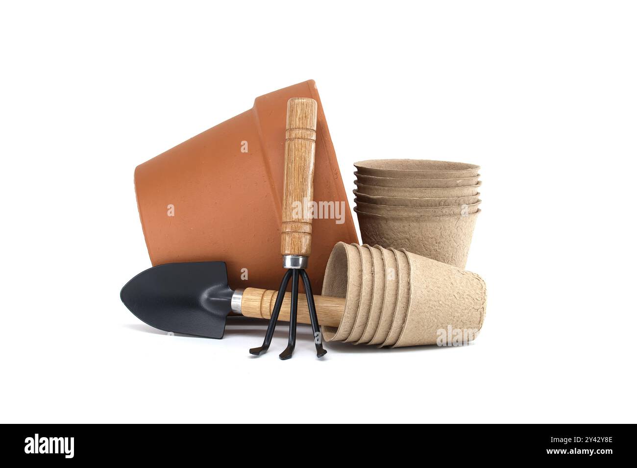 Image of gardening tools including a terracotta pot, a spool of twine ...