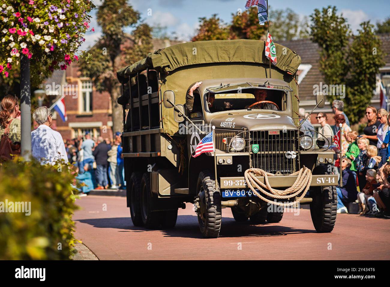 Reenactors drive through the town of Neunen with original vehicles from ...