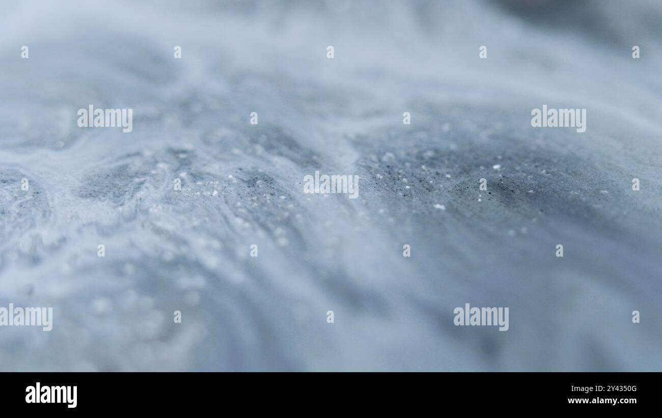 Paint splash. Fluid spill. Defocused gray white color emulsion shiny ...