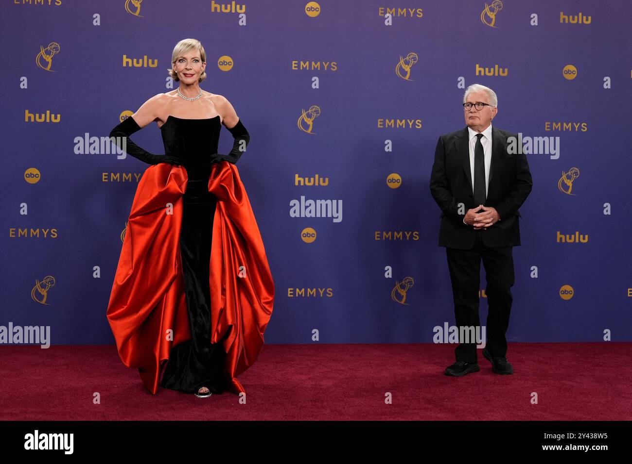 Allison Janney, left, and Martin Sheen pose in the press room during ...