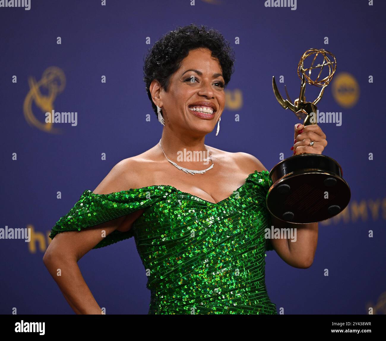 Liza Colón-Zayas holds her Emmy for Outstanding Supporting Actress in a ...