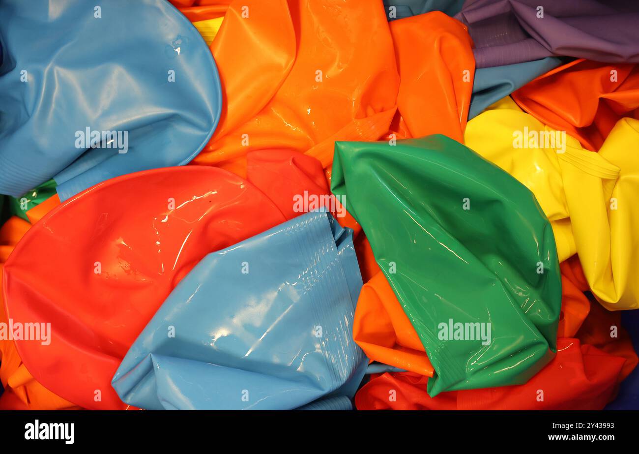 A range of multi colored individual swimming caps. Stretchy rubber ...