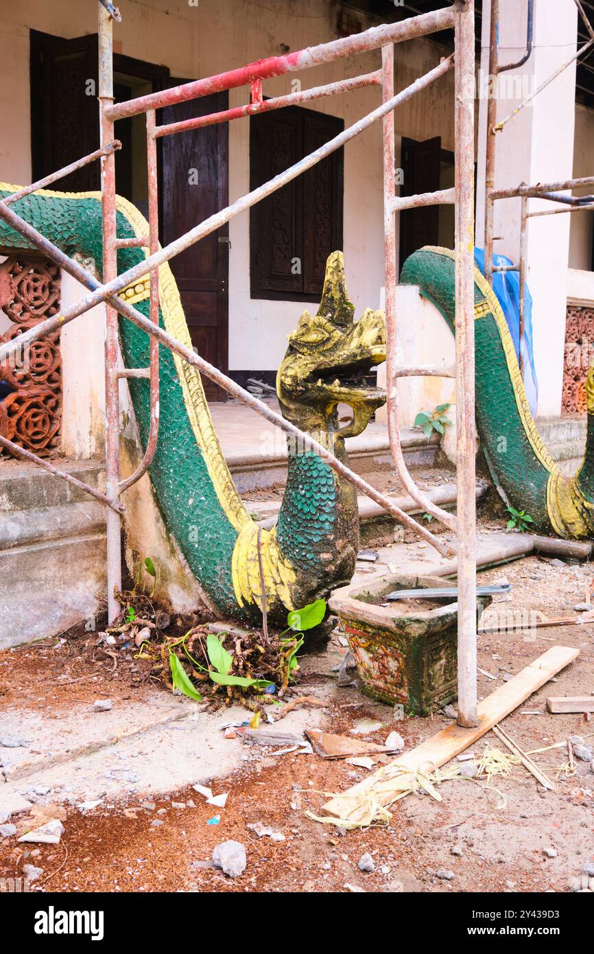 Green dragon railing on steps detail. Construction, restoration work at ...