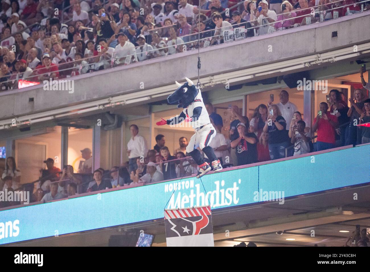 Houston, TX, USA. 15th Sep, 2024. Houston Texans mascot Toro is raised ...