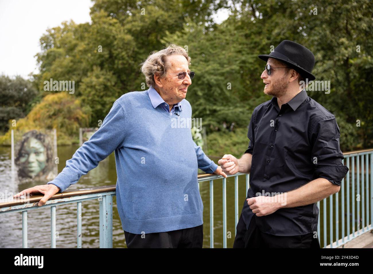 EDITORIAL USE ONLY Artist, Luis Gomez de Teran (right) talks with Game ...