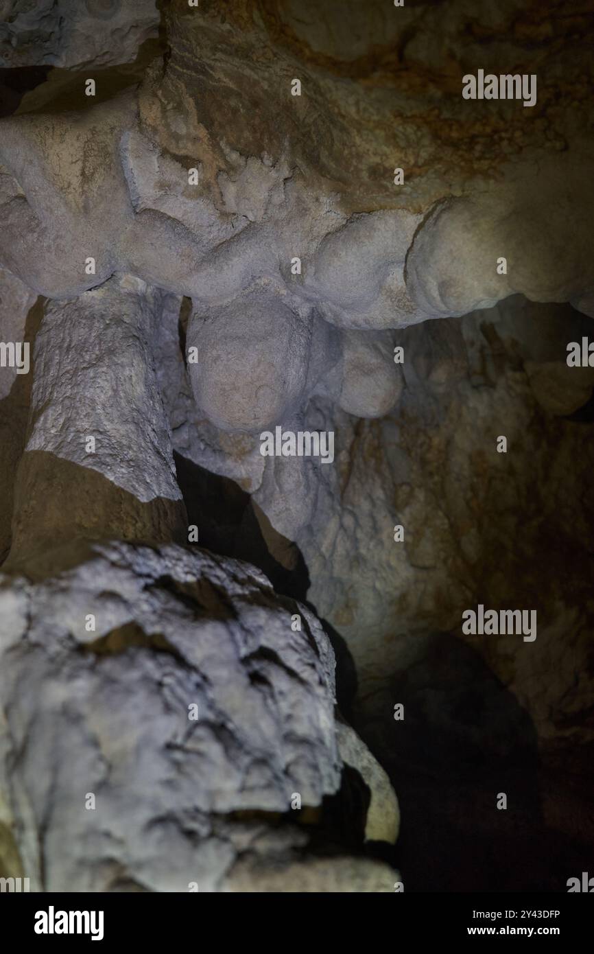 Cave underground in the limestone mountains with various formations ...