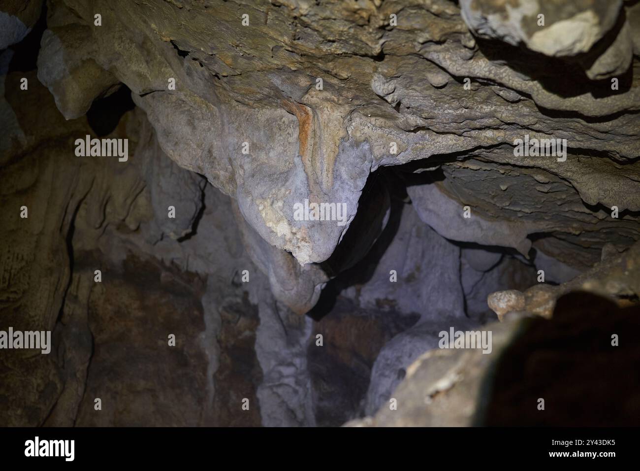Cave underground in the limestone mountains with various formations ...