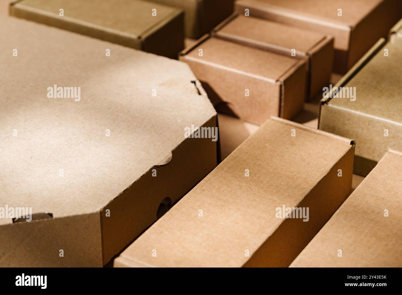 Multiple cardboard boxes arranged on a surface for packaging and ...