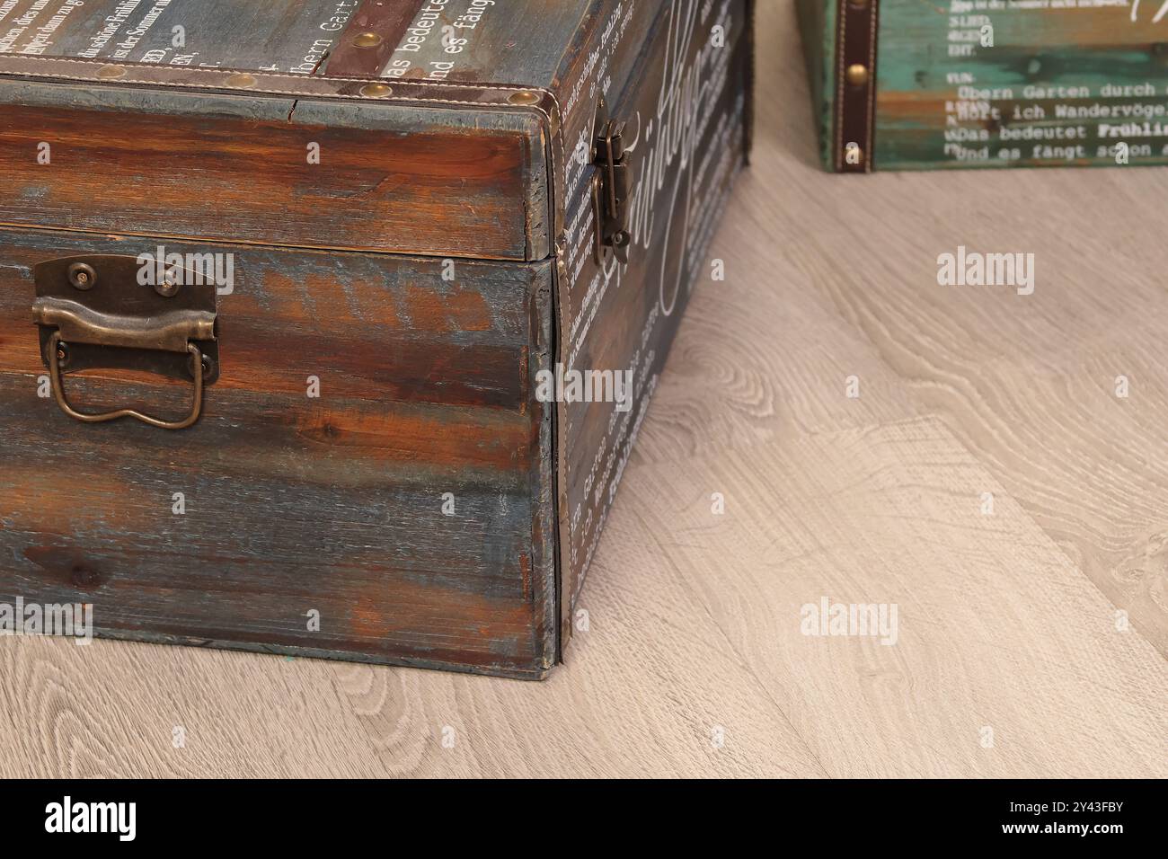 Colorful wooden chests on floor. Background for design. Traditions and ...