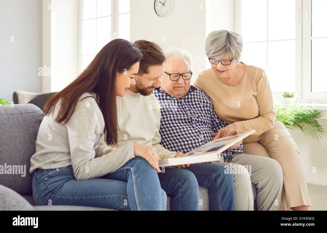 Happy family senior old parents adults daughter son sits together on ...