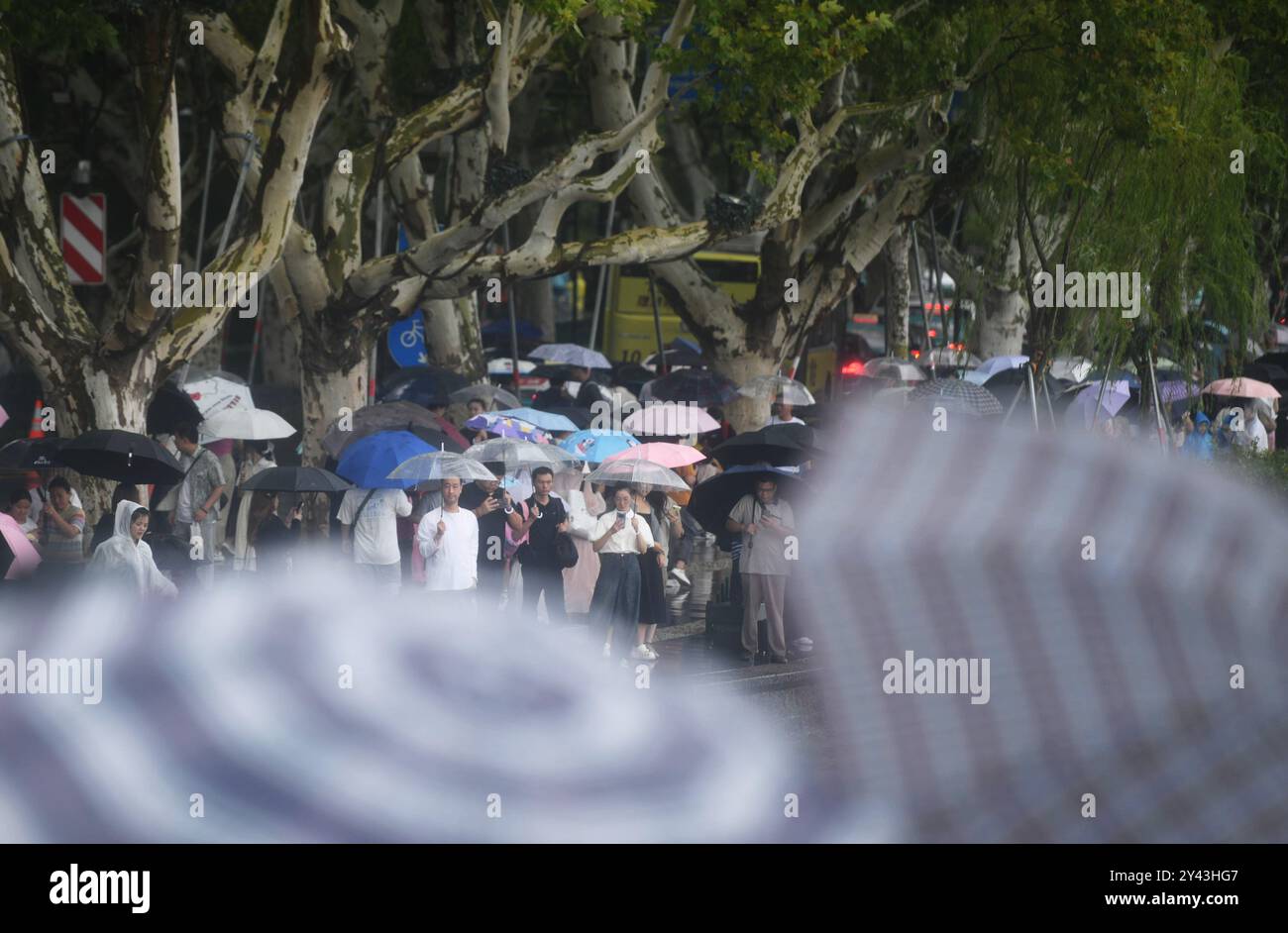 HANGZHOU, CHINA - SEPTEMBER 16, 2024 - Tourists visit the West Lake ...