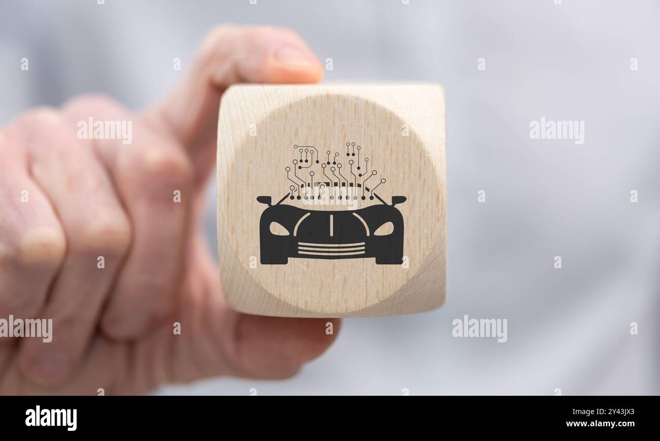 Hand holding a wooden cube with symbol of autonomous car concept Stock ...