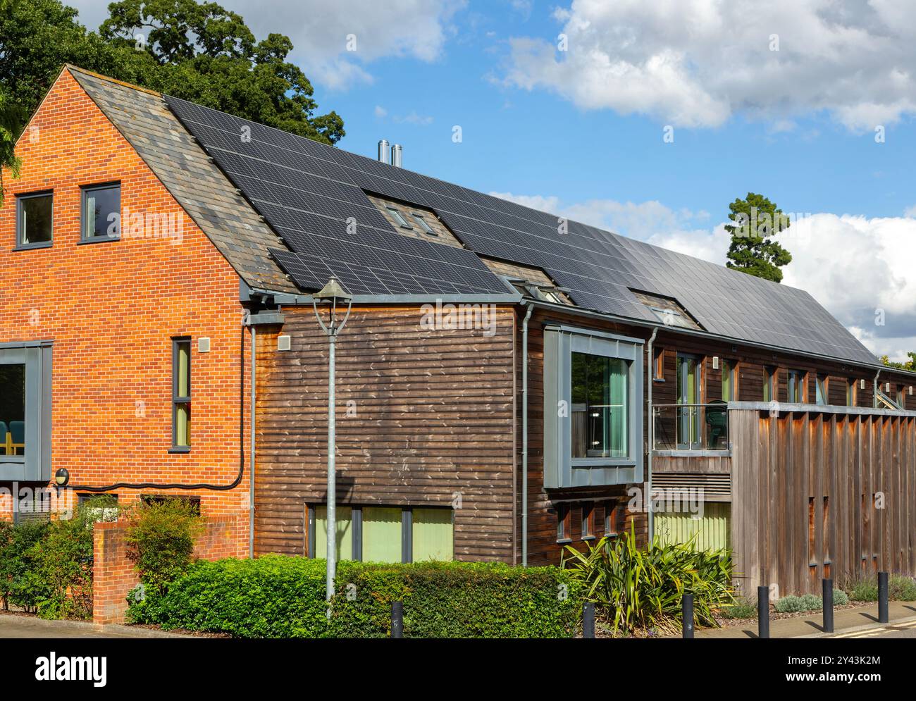 Roof of building covered with photovoltaic solar panels, Framfield ...