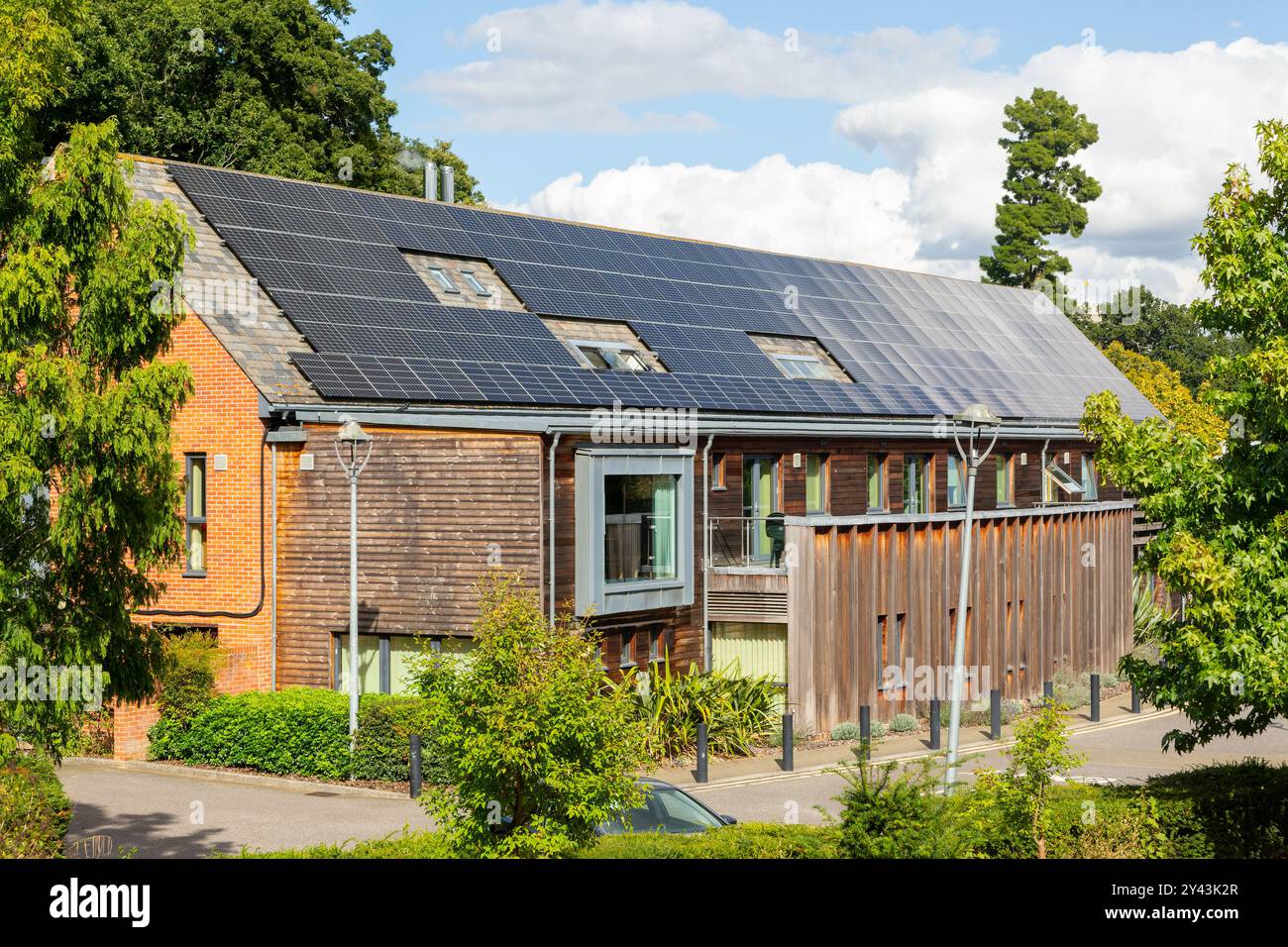 Roof of building covered with photovoltaic solar panels, Framfield ...