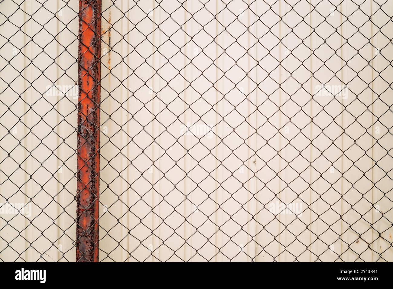 Corroded metal post and chain link fence pattern as background Stock ...