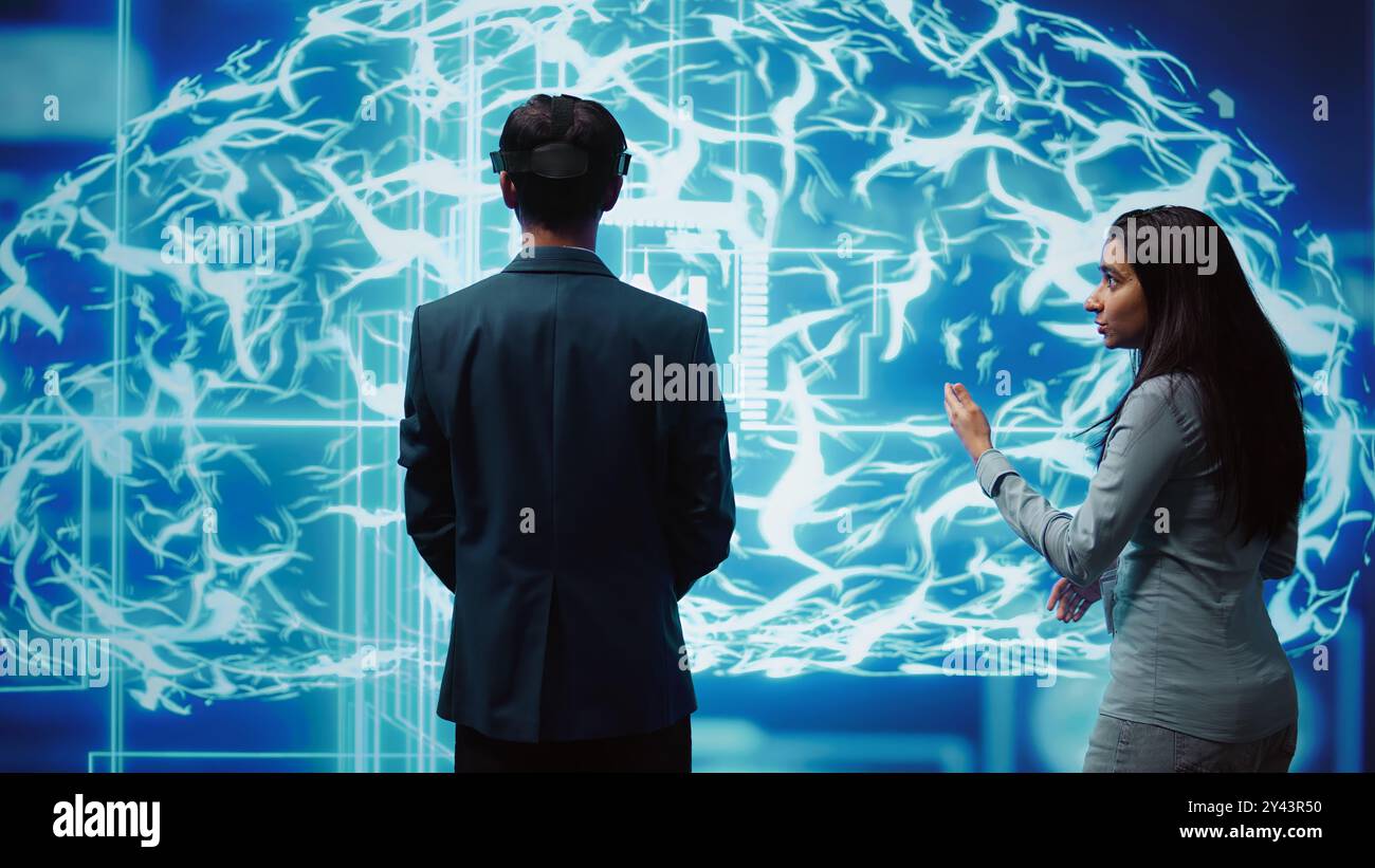 Engineers use VR headset and AR hologram, looking at AI neural networks modeled after human ...