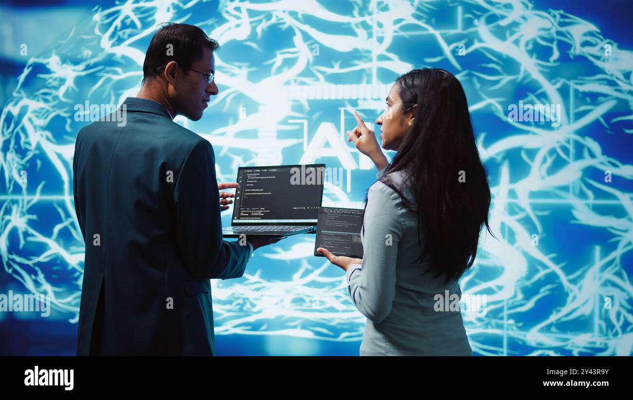 Programmers using devices and AI neural networks modeled after human brain to solve complex ...