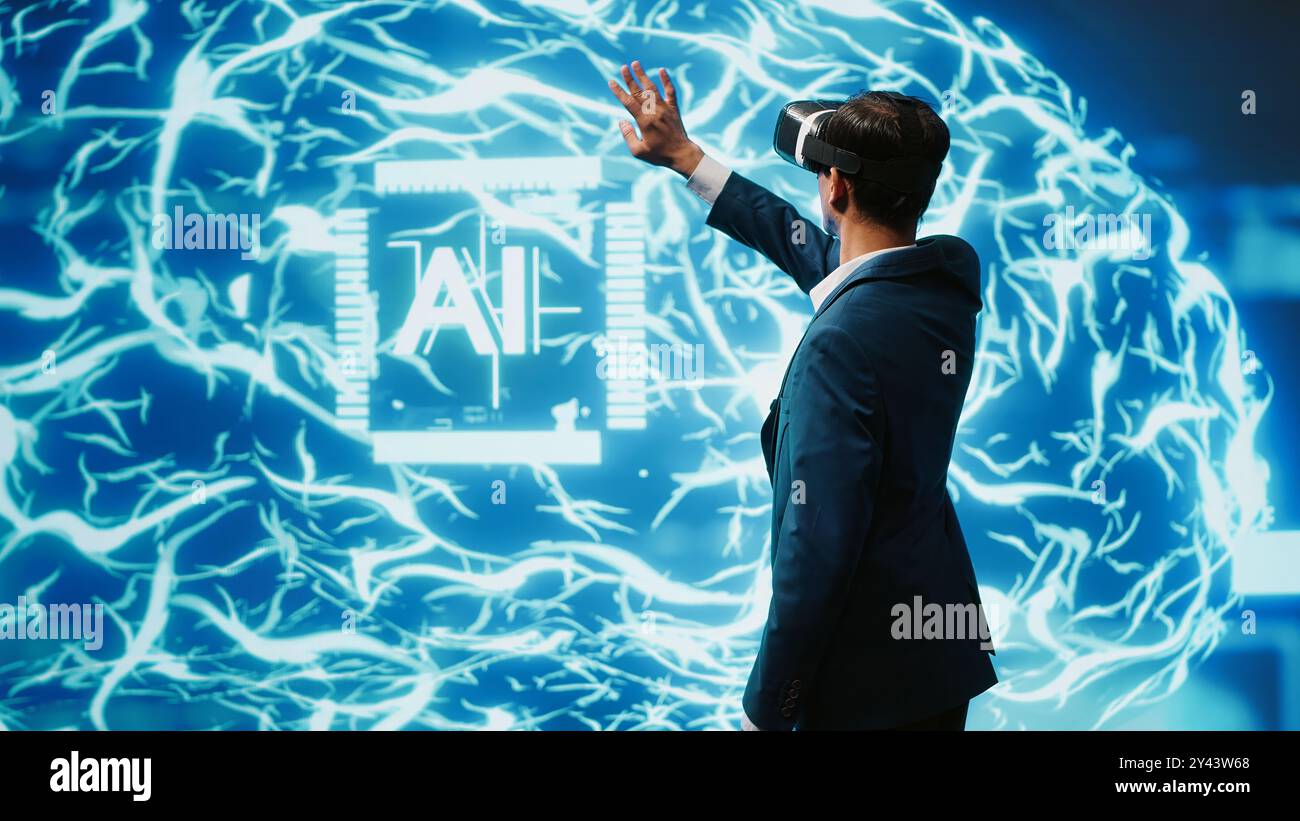 Computer scientist wearing VR headset looking at hologram of artificial ...