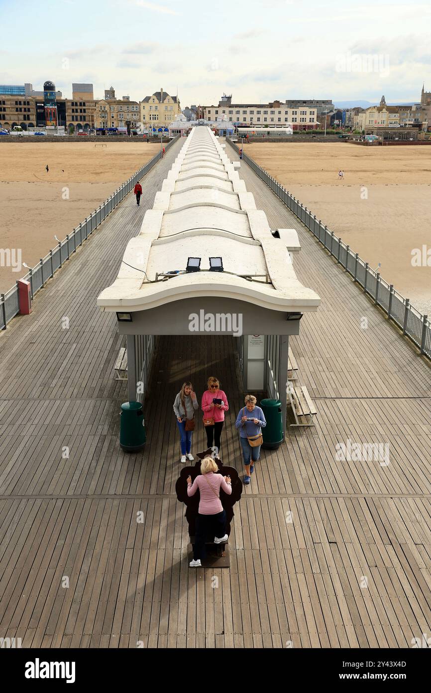 Fun and laughter taking photos on the pier Stock Photo - Alamy
