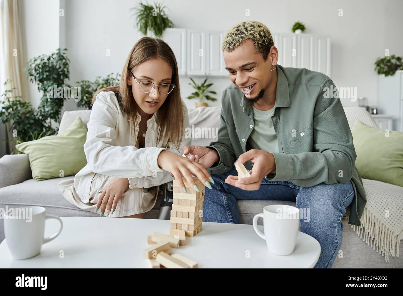 Two friends play a game together, sharing laughter and a warm ...