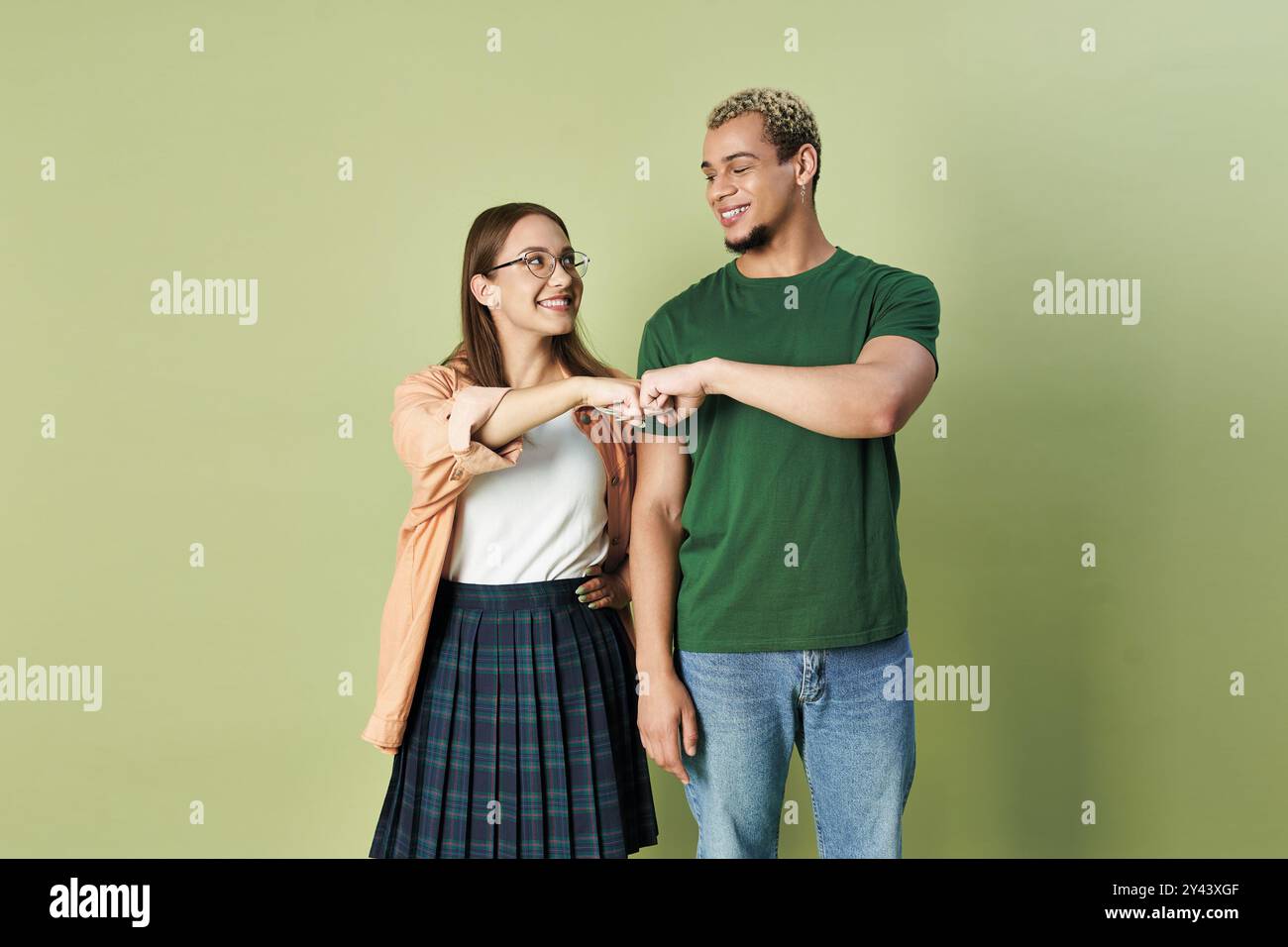 Two friends celebrate their bond with smiles and playful gestures Stock ...