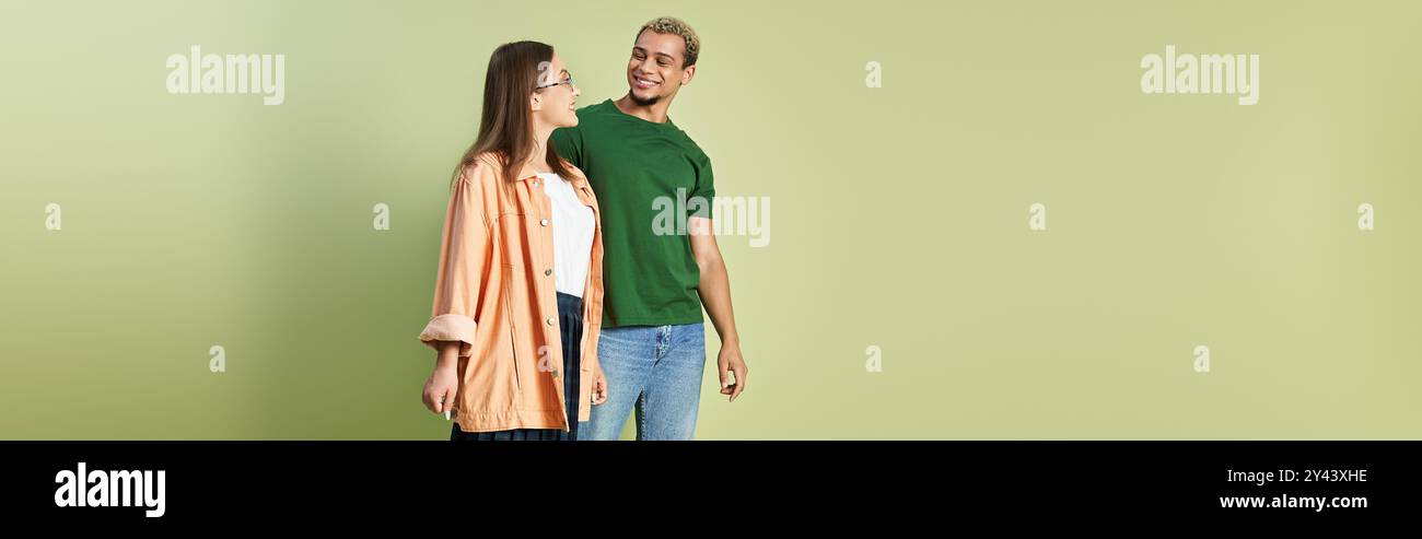 Two friends enjoy each other in a lively environment Stock Photo - Alamy