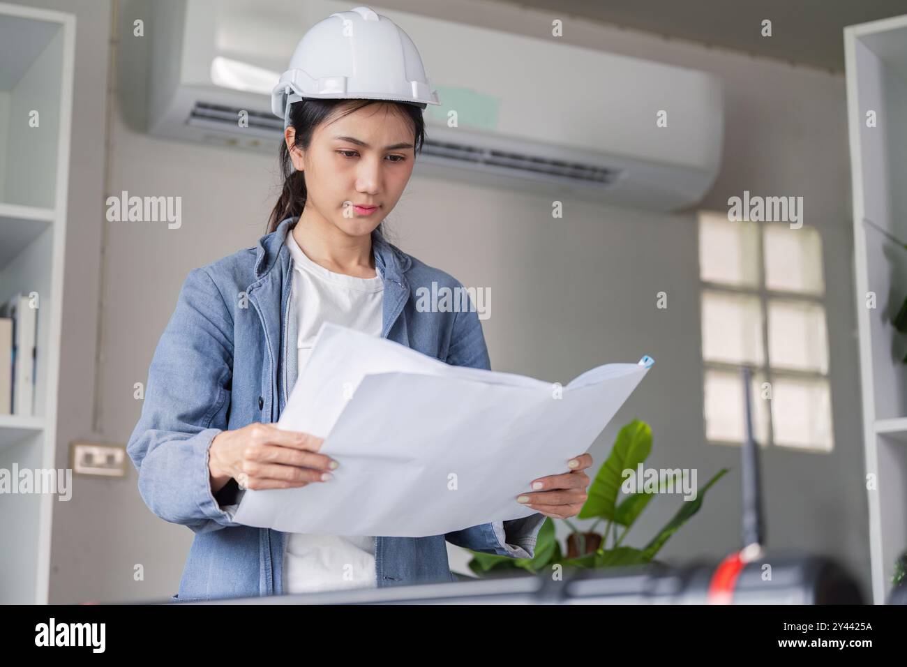 Civil Engineer Reviewing Blueprint Plans For Efficient Execution In 1596