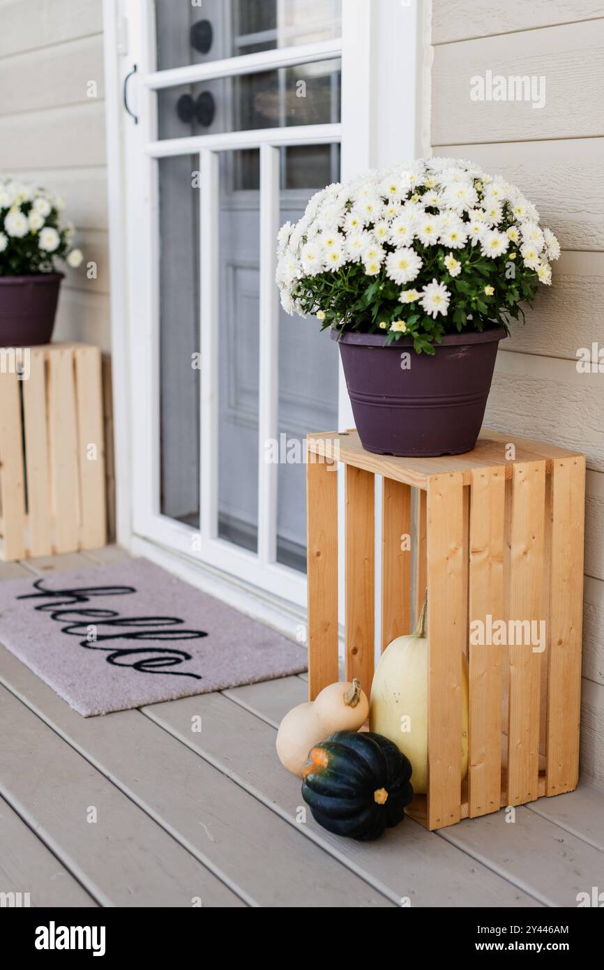 Fall decorated front porch with squash and flowers Stock Photo - Alamy