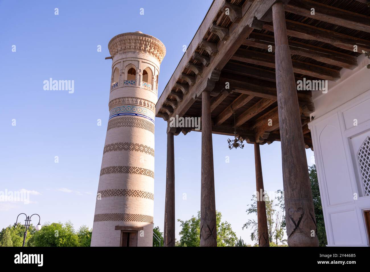 A tall tower with a blue stripe on it Stock Photo - Alamy