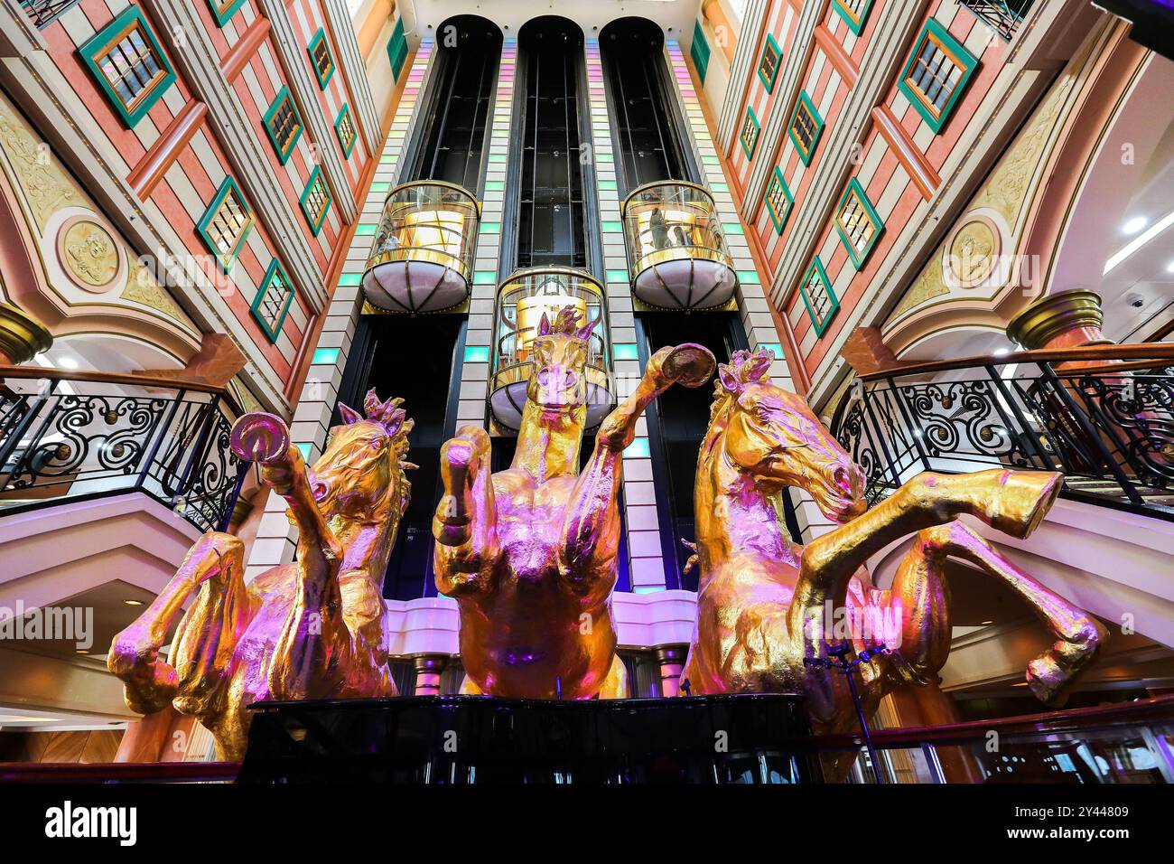 Asian cruise ship colorful atrium, stairs, lobby, interior, golden ...
