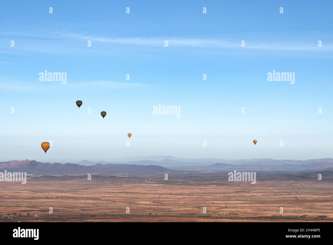 Hot air balloons over mountains hi-res stock photography and images - Alamy