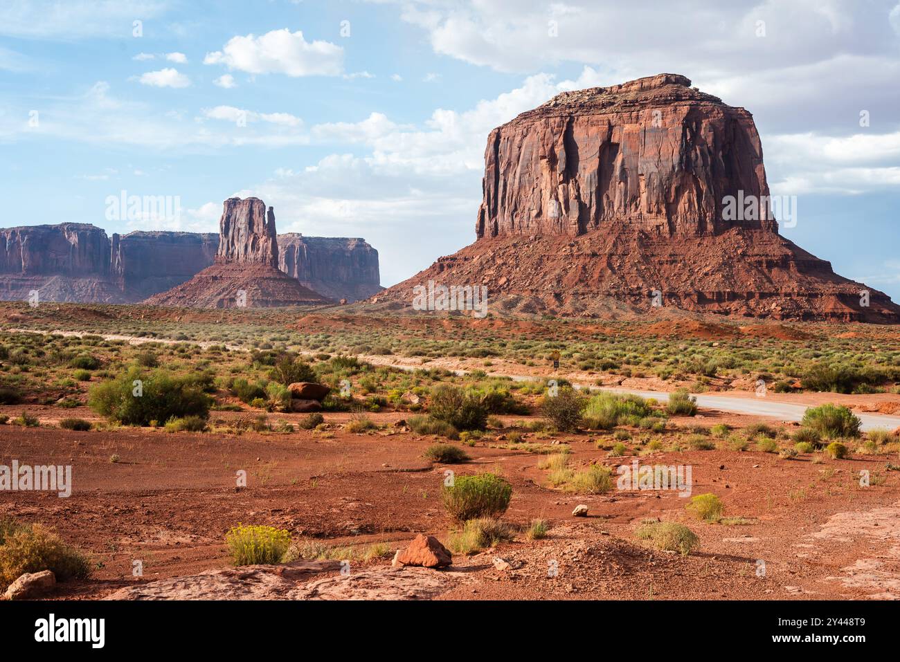 Monument Valley's towering buttes rise from the red desert Stock Photo ...