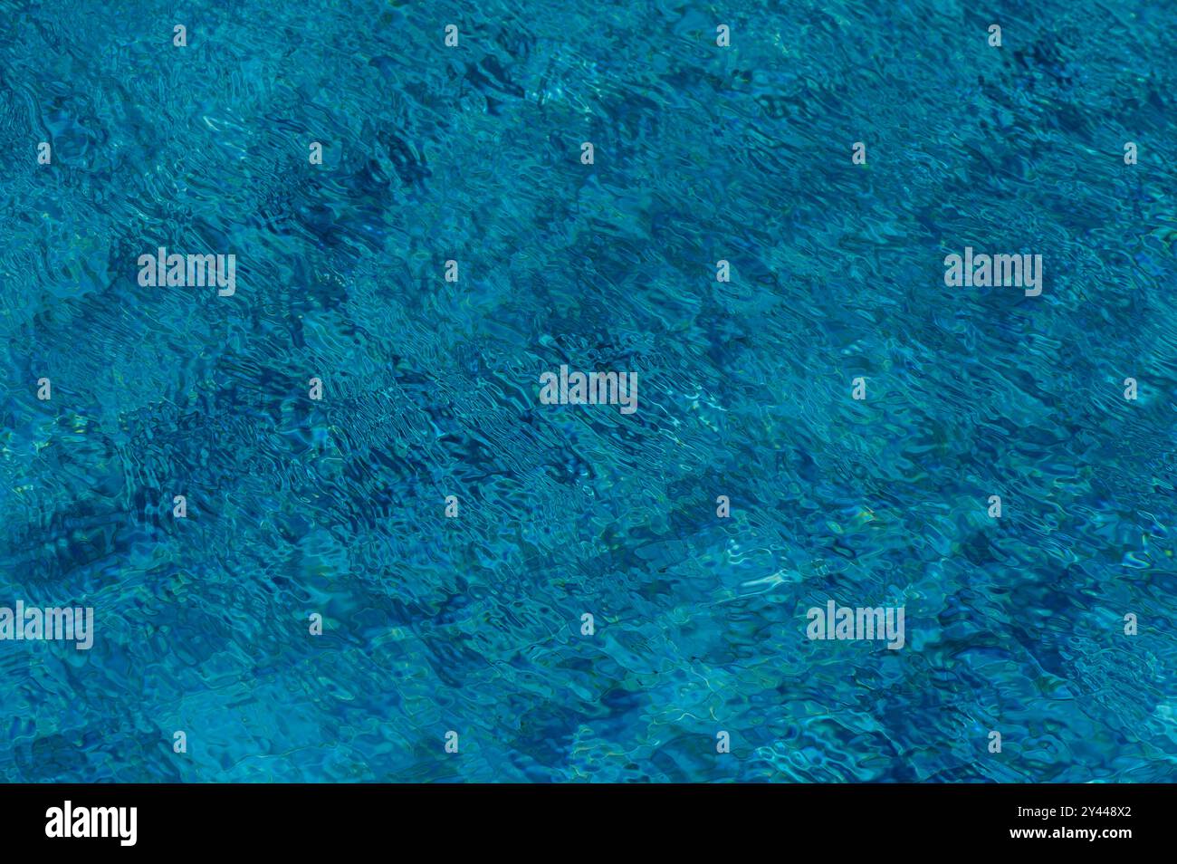 Blue ripped water in swimming pool Stock Photo - Alamy