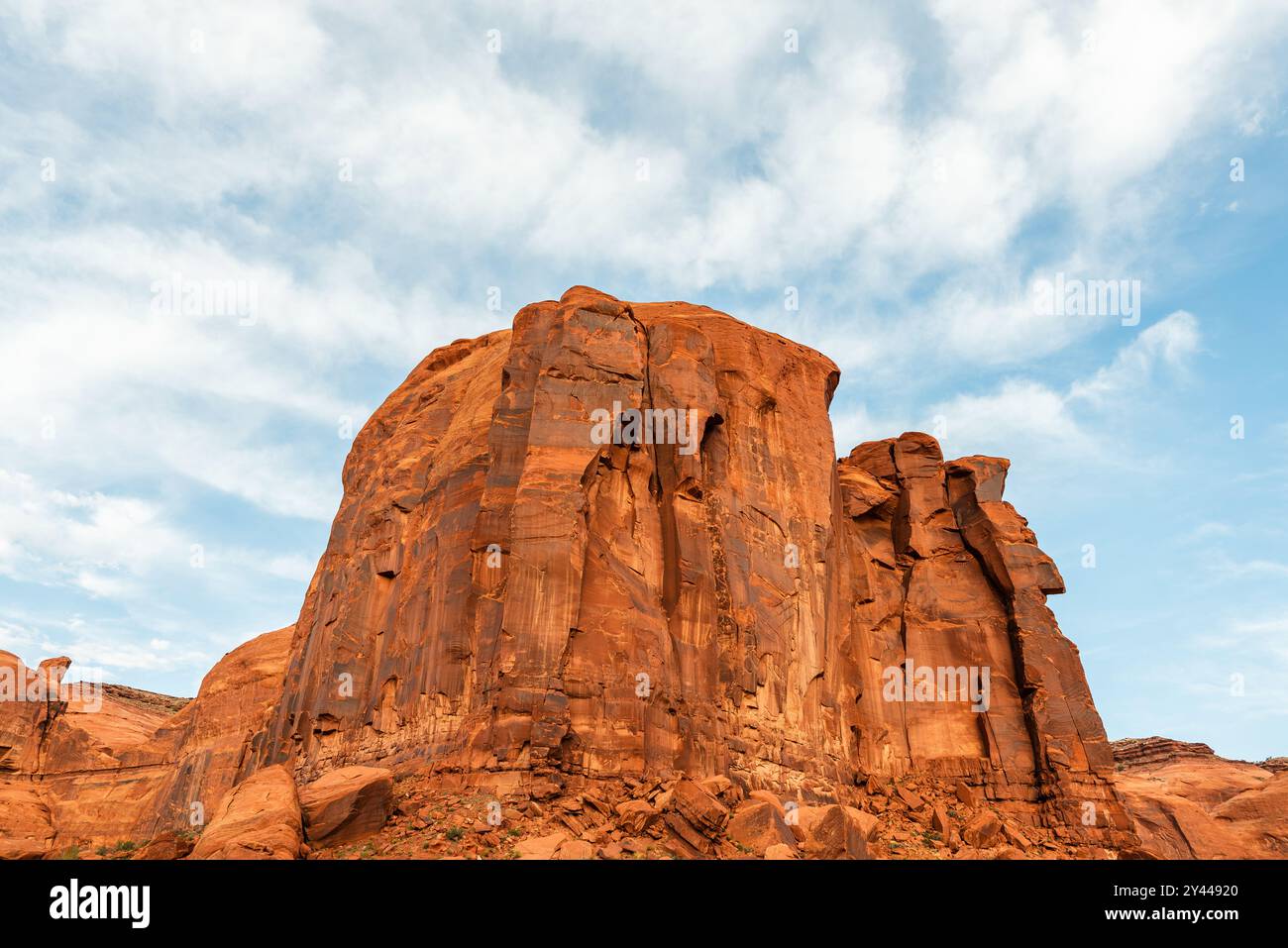 Dramatic red rock formation in Monument Valley under a blue sky Stock ...