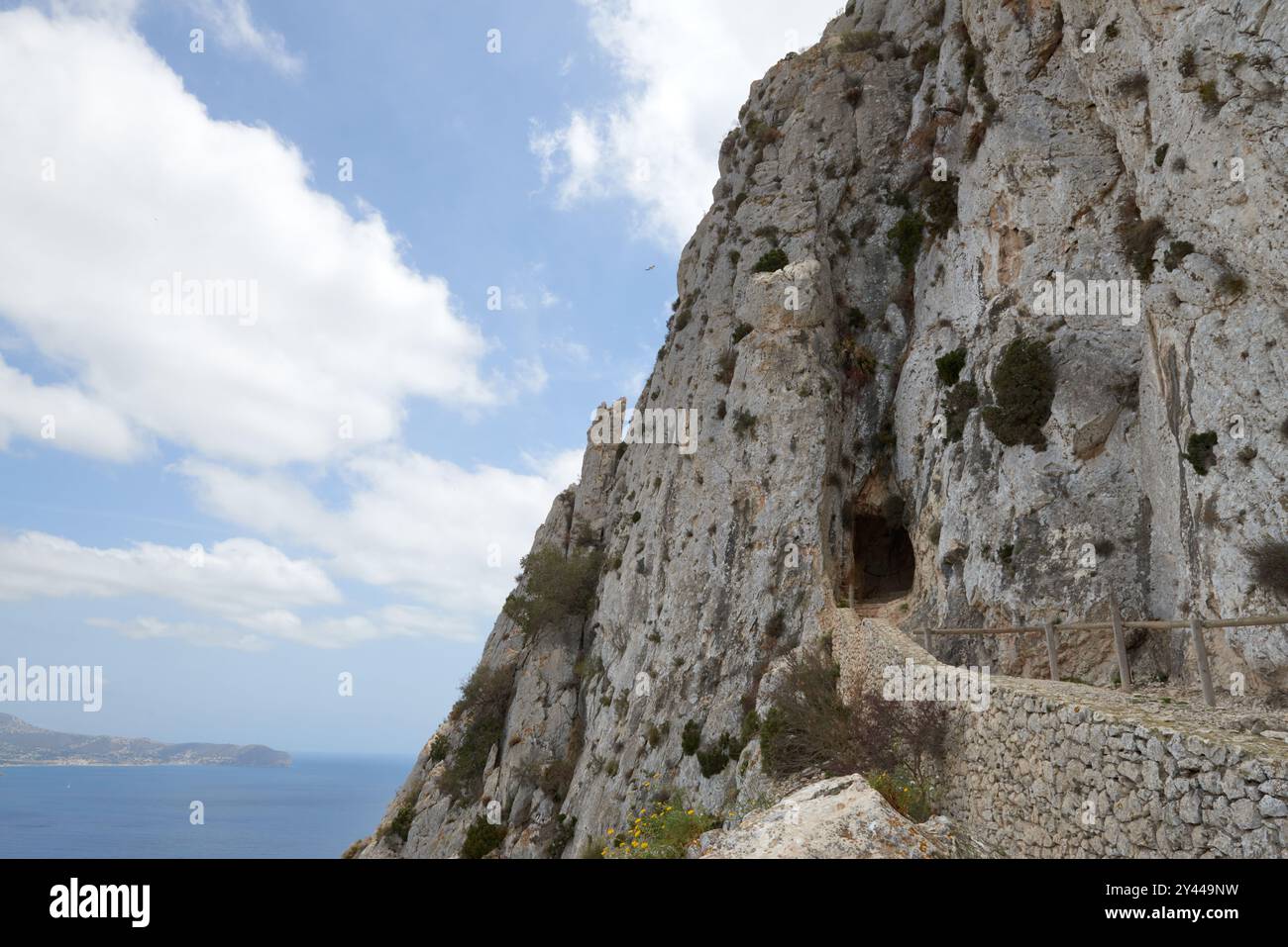 Ancient Rock Tunnel Framing Breathtaking Ocean Vista: Nature's Gateway ...