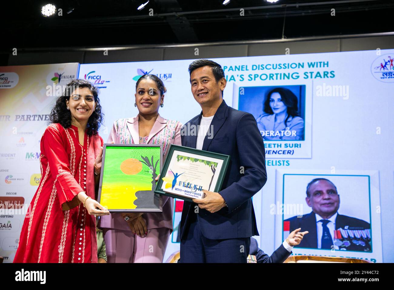 NEW DELHI, INDIA - SEPTEMBER 11: Bhaichung Bhutia (Football) (R), with Payal Kanodia, (C ...