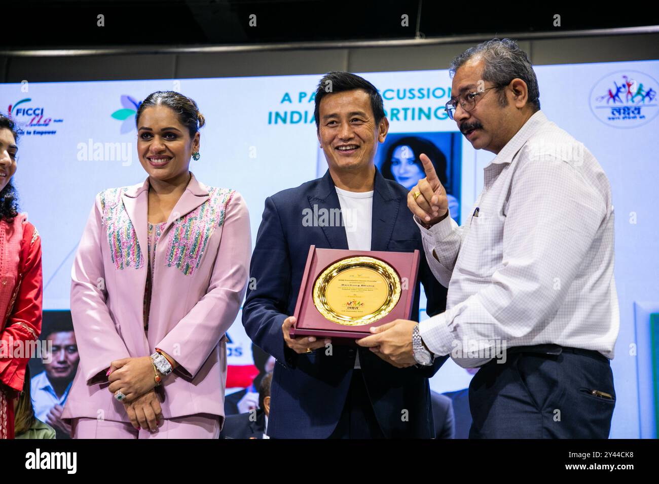 NEW DELHI, INDIA - SEPTEMBER 11: Bhaichung Bhutia (Football) (2R), with Payal Kanodia, (2L ...